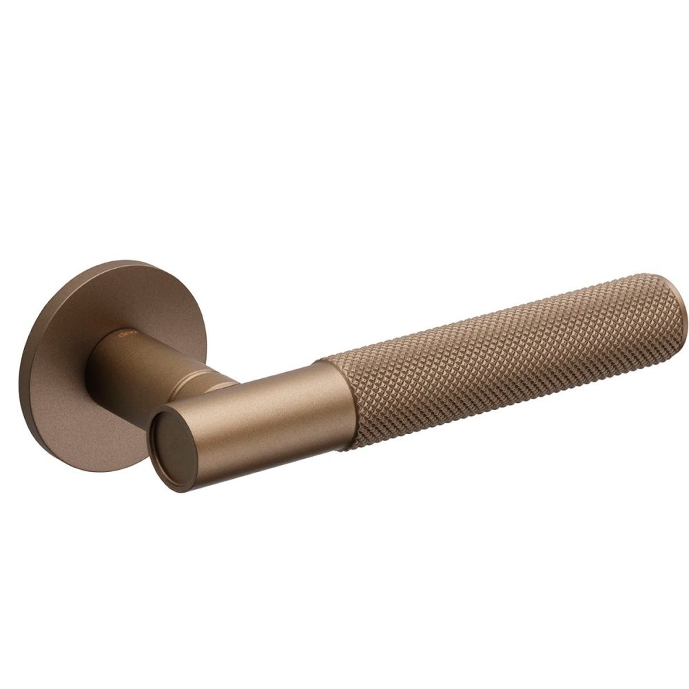 DND Blend AG deurkruk op rond rozet - pearl bronze| designer deurbeslag ...